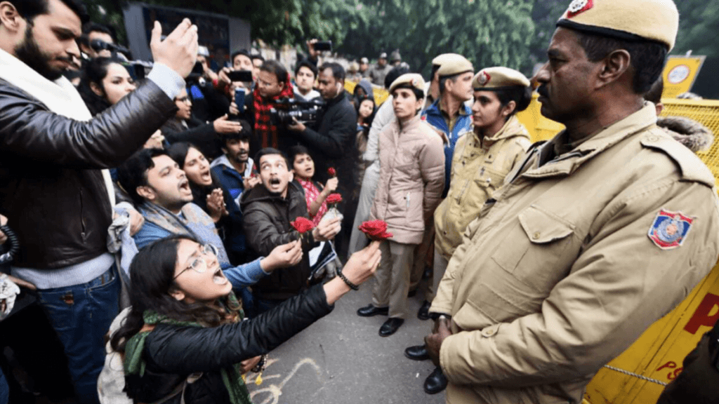 Handing Flowers To The Delhi Police: A Powerful Symbol Or Wilful Ignorance?